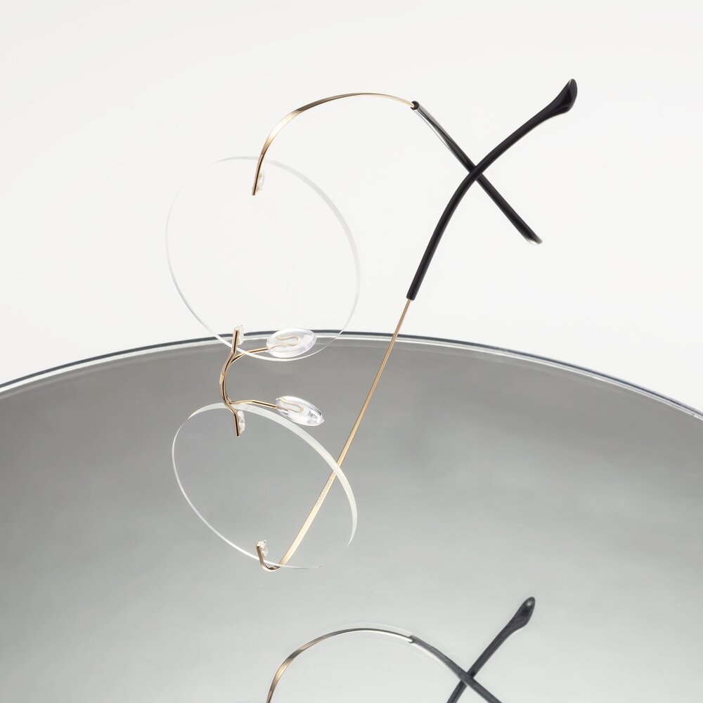 Gold Lightweight Round Rimless Eyeglasses Artist