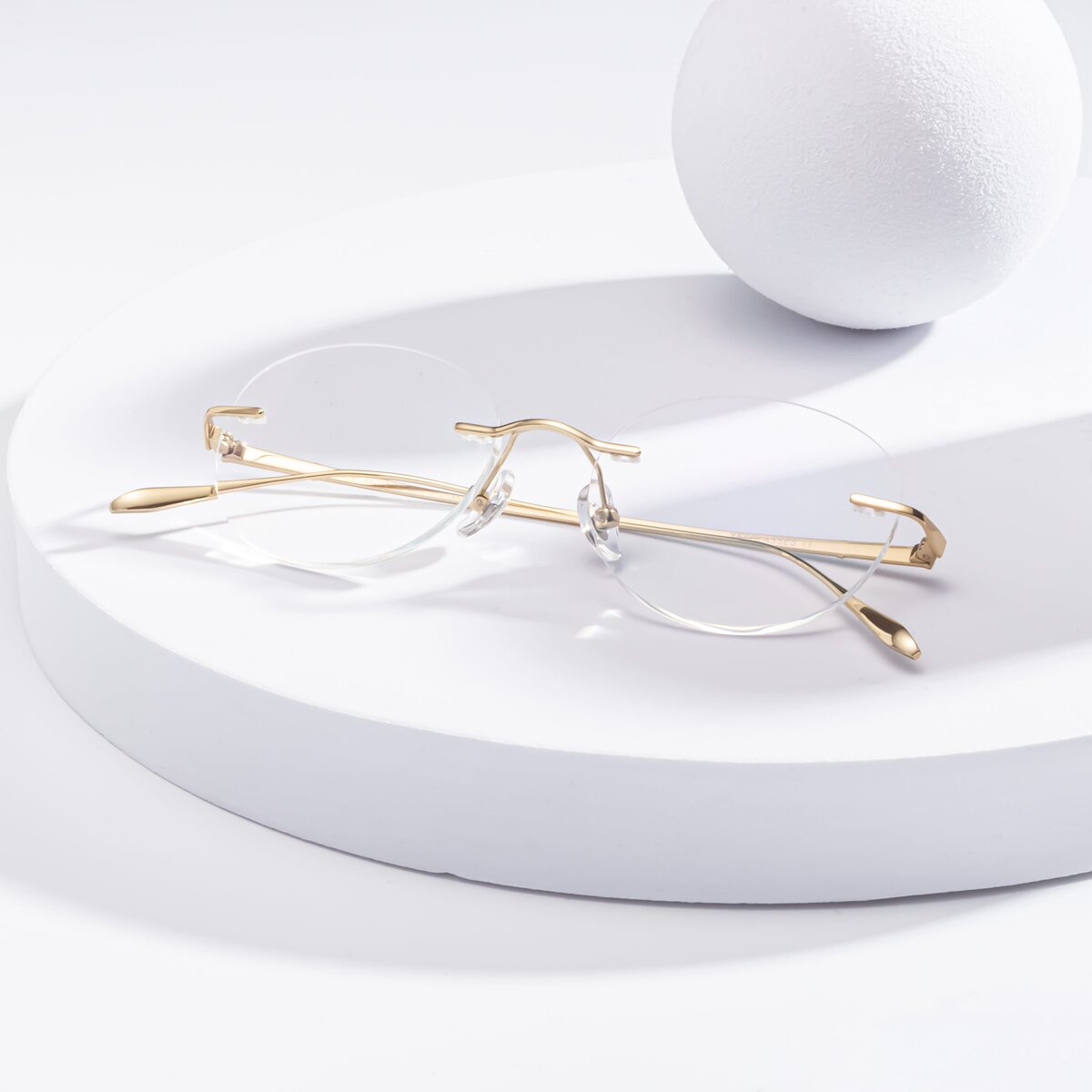 Gold Titanium Oval Rimless Eyeglasses - Sober