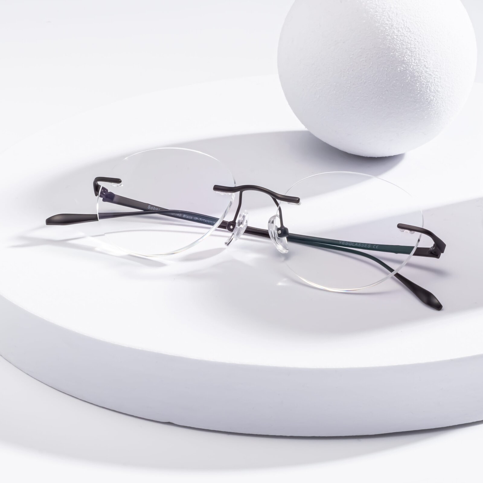 Black Titanium Oval Rimless Eyeglasses - Sober