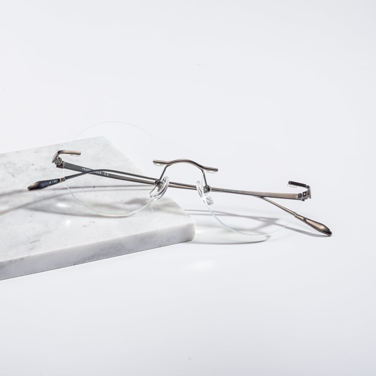 Gunmetal Retro-Vintage Round Rimless Eyeglasses - Sunrise